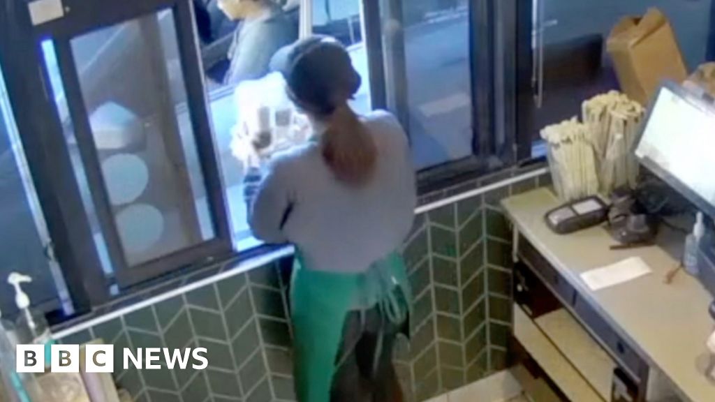Moment drink falls on man's lap leading to $50m settlement - BBC News