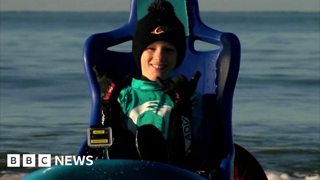 Boy with cerebral palsy wins adaptive surfing award - BBC News