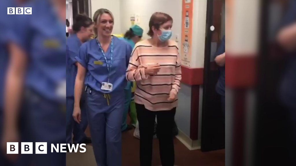 Coronavirus: NHS staff clap for Covid-19 recovering nurse