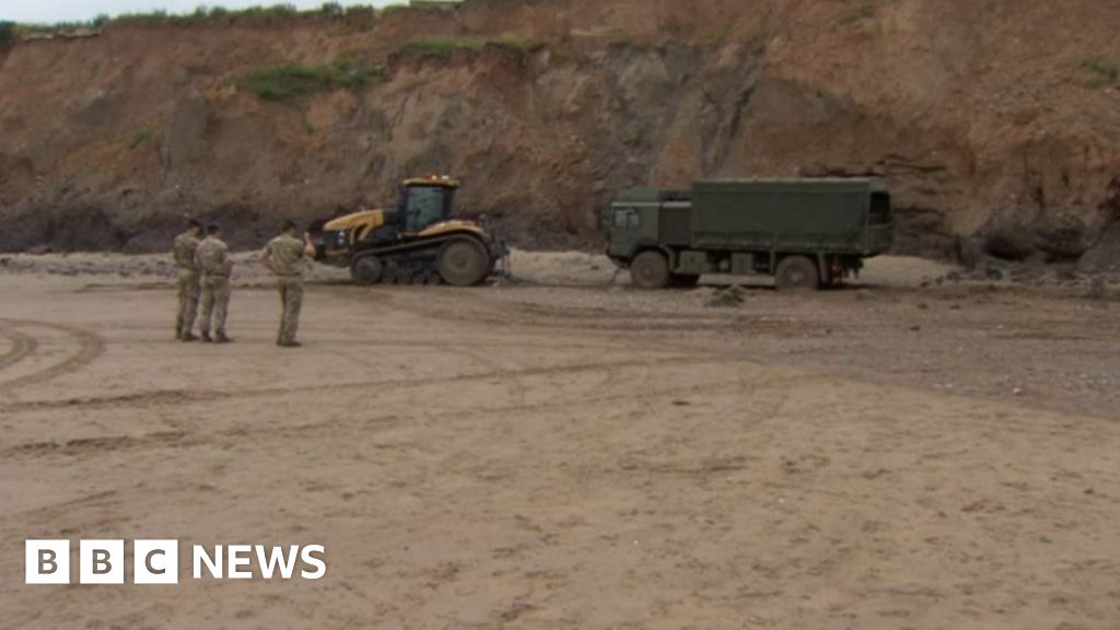Farmer rescues bomb disposal truck stuck at Mappleton beach - BBC News
