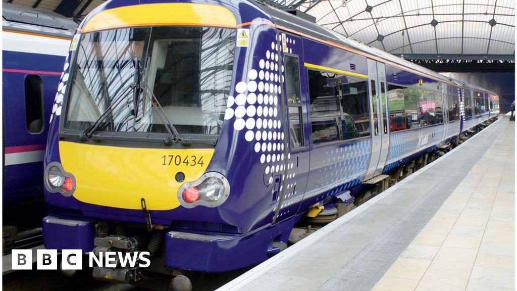 Passengers evacuated after train wheel fire - BBC News