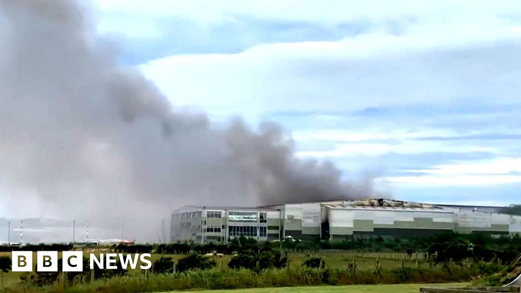 Crews remain at scene of Aberdeen recycling fire - BBC News