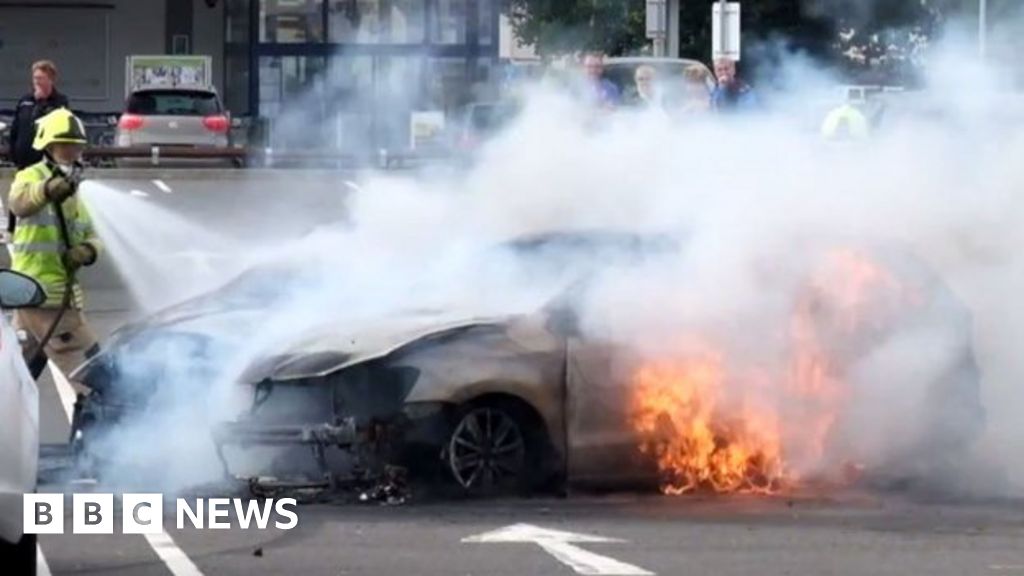 Two cars on fire after crash outside Cardiff City Stadium - BBC News