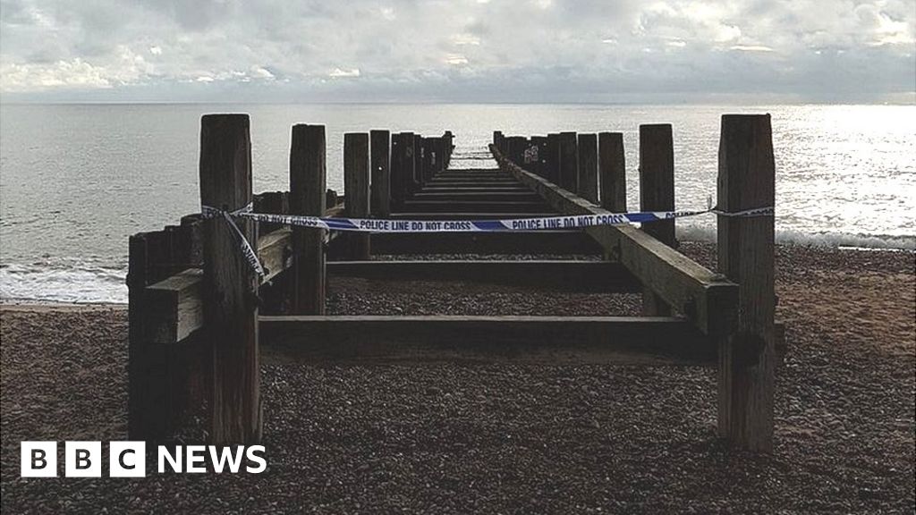 Experts blow up WW2 grenade on Gunton Cliff beach - BBC News