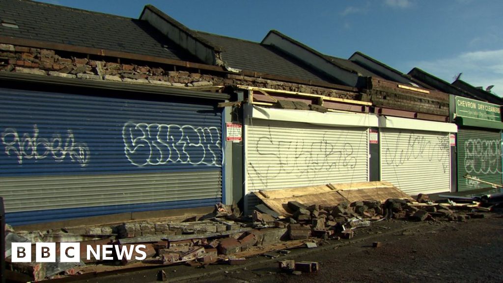 Shopfronts collapse in high winds of Storm Dennis - BBC News