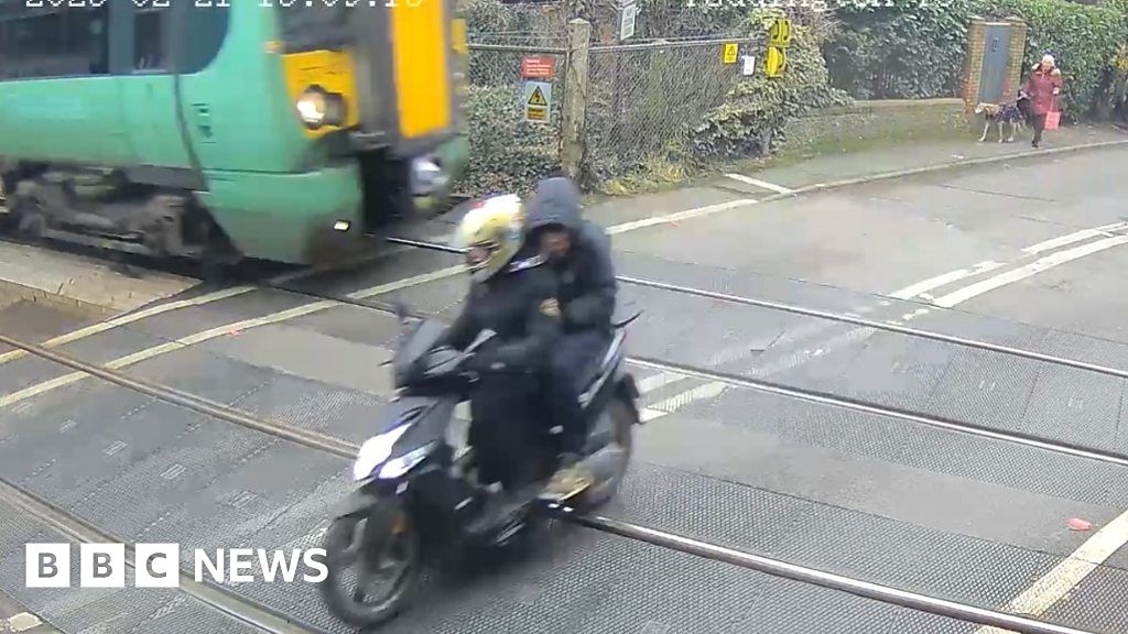 Footage shows moped's near miss at Littlehampton level crossing