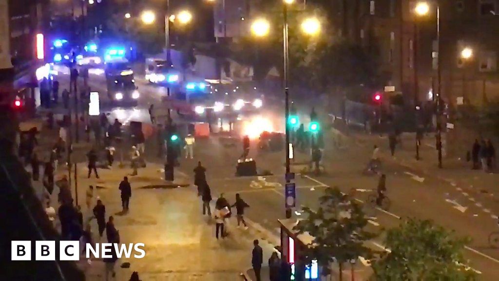Hackney protest: Bottles are thrown at police in east London - BBC News