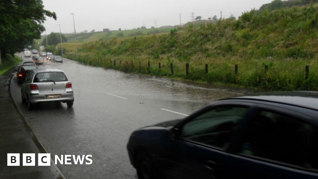 Work under way on flood-hit A590 at Lindal in Furness - BBC News