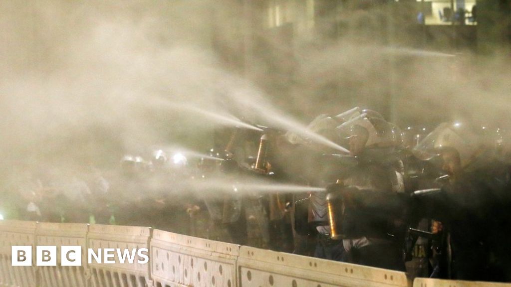 Tear gas fired at protesters outside Brazil's Congress - BBC News