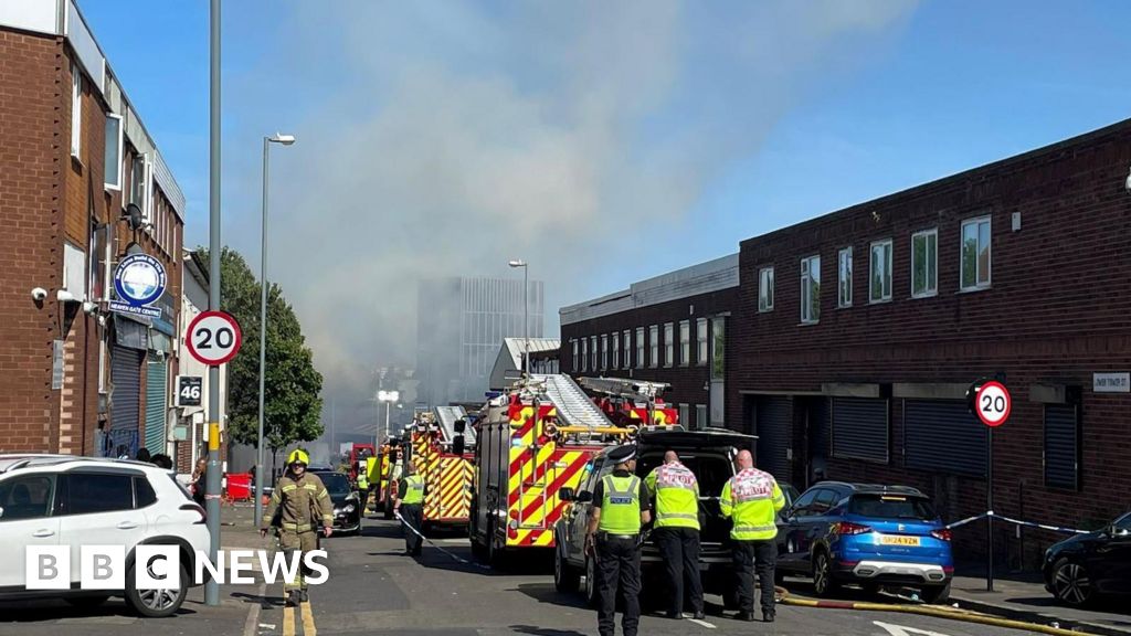 Explosions heard as 50 firefighters tackle blaze in Birmingham - BBC News