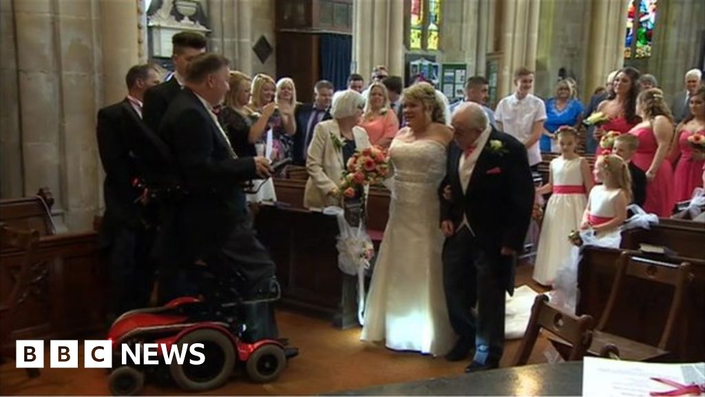 Groom stands for bride in wedding vow surprise - BBC News
