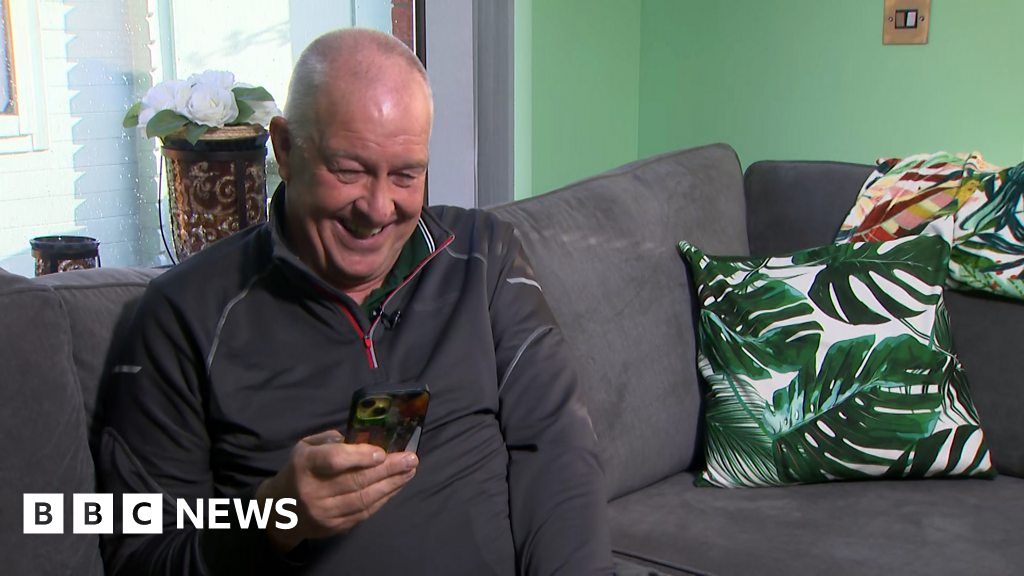 Cleared sub-postmaster tells his family: 'I'm free'