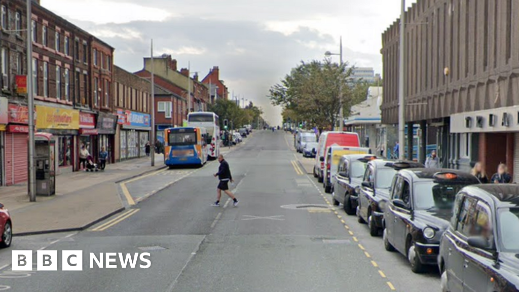 Man seriously hurt after being hit by a bus in Bootle - BBC News