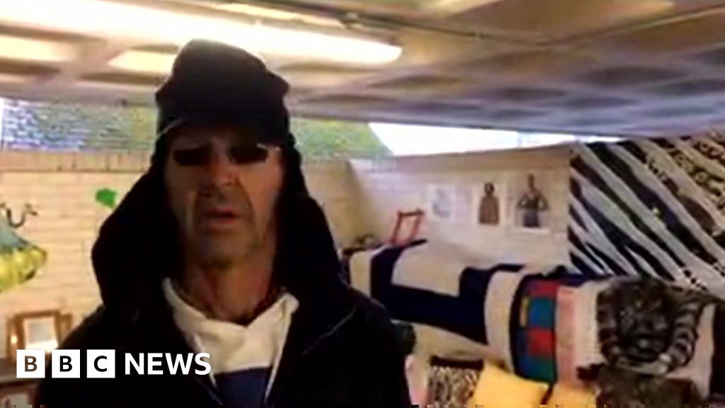 Homeless man gives tour of parking space home - BBC News
