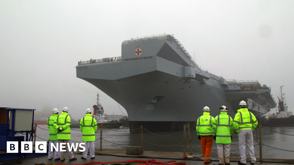 HMS Prince of Wales leaves Rosyth dock for first time