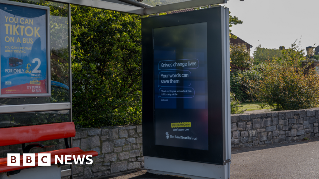 Bournemouth AI bus shelter screen warns of knife crime - BBC News