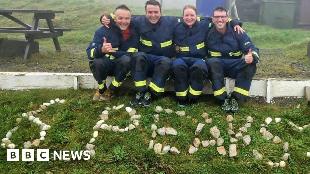 Isle of Man firefighters tackle six peaks charity challenge - BBC News