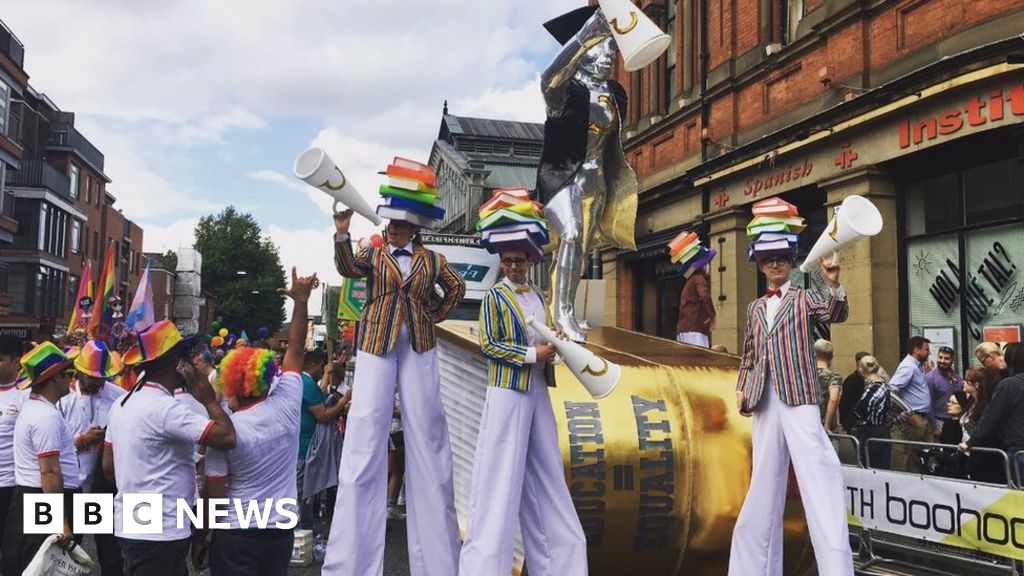 Manchester Pride: Thousands line streets for 'Graduation Parade' - BBC News