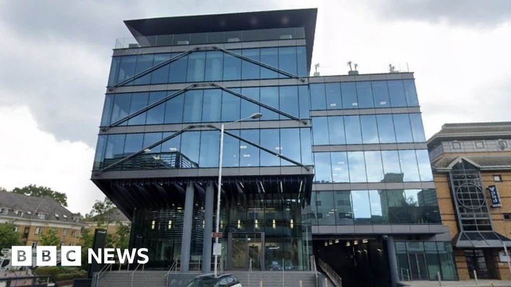 McLaren ends lease on Woking town centre building - BBC News