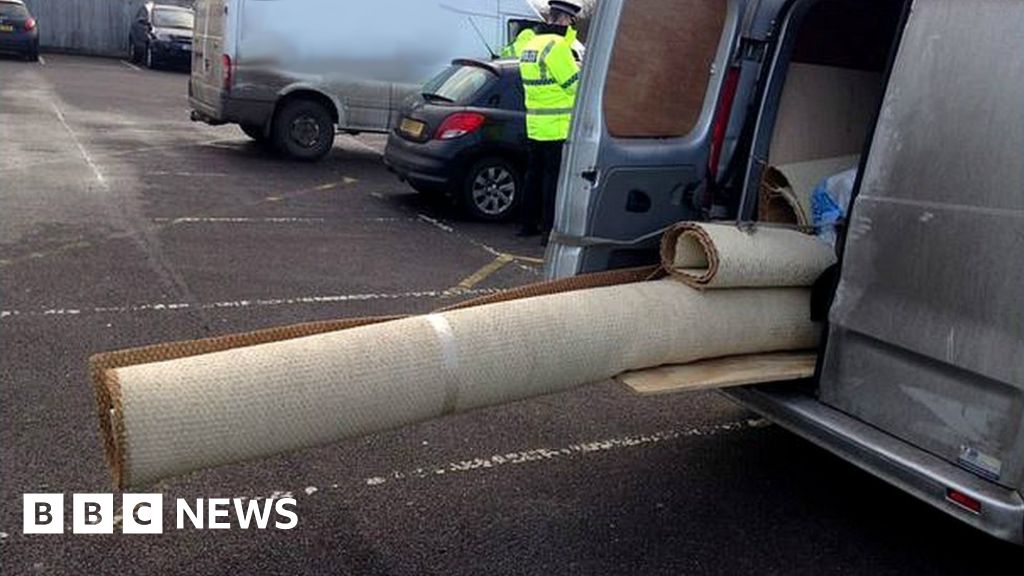 Hertfordshire Police officer unamused at carpet caper - BBC News