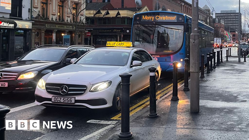 Translink chief has concerns about taxis using bus lanes in Belfast - BBC News