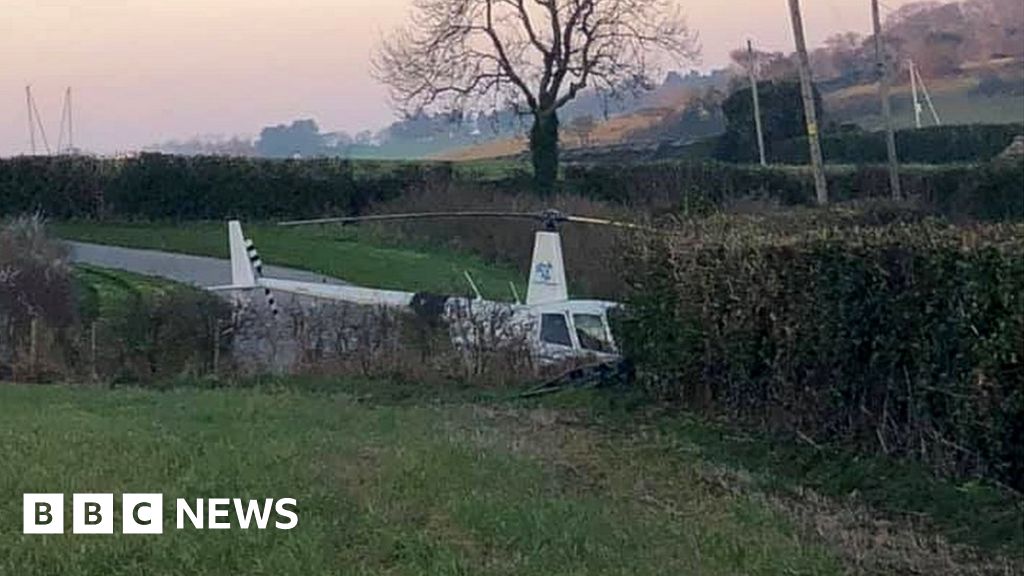 Helicopter hits power line in road landing in Killinchy - BBC News