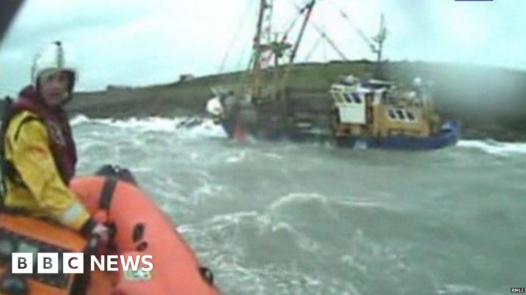 Three men are saved from a sinking trawler off County Cork - BBC News