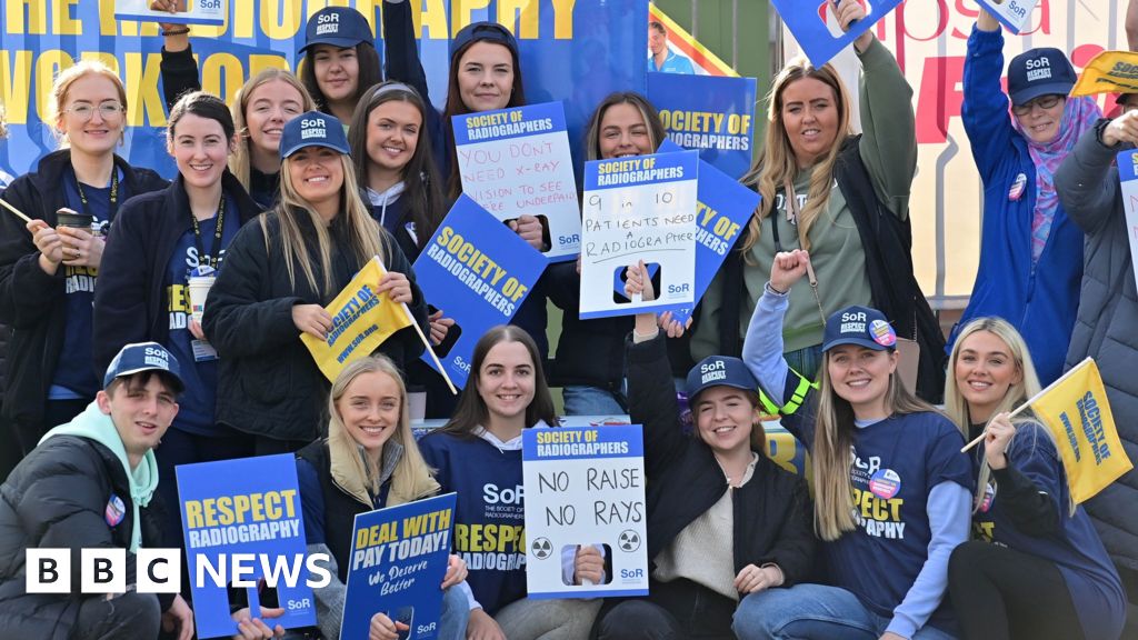 Strike action: Thousands of health workers walk out over pay - BBC News