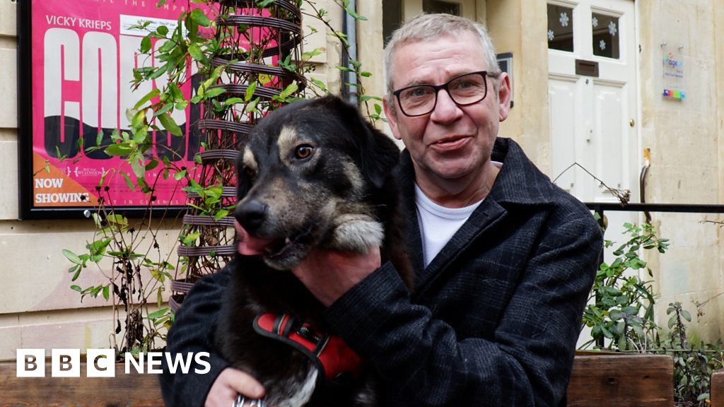 Bath Big Issue seller finds new dog companion after being trolled - BBC ...