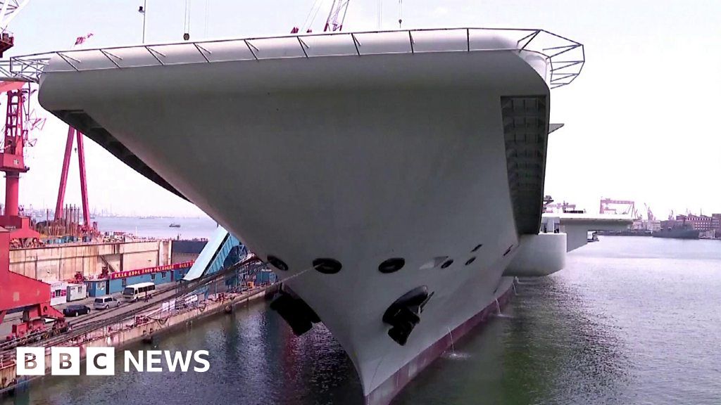 China's first home-built carrier starts sea trials - BBC News