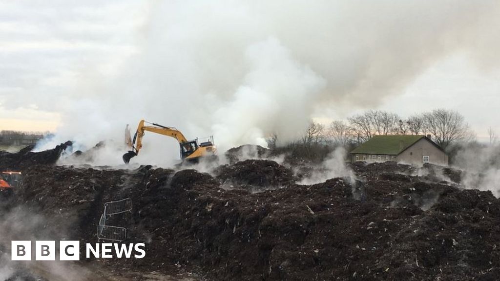 Envar Composting: Fire still burning after a month - BBC News