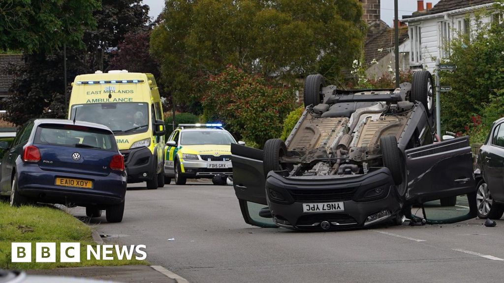 Dronfield road closed after car flips