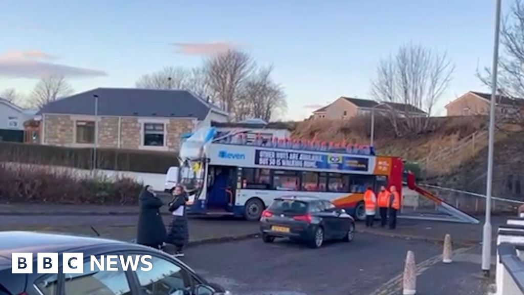 Bus roofless after driving through rail bridge tunnel in Kilmarnock ...