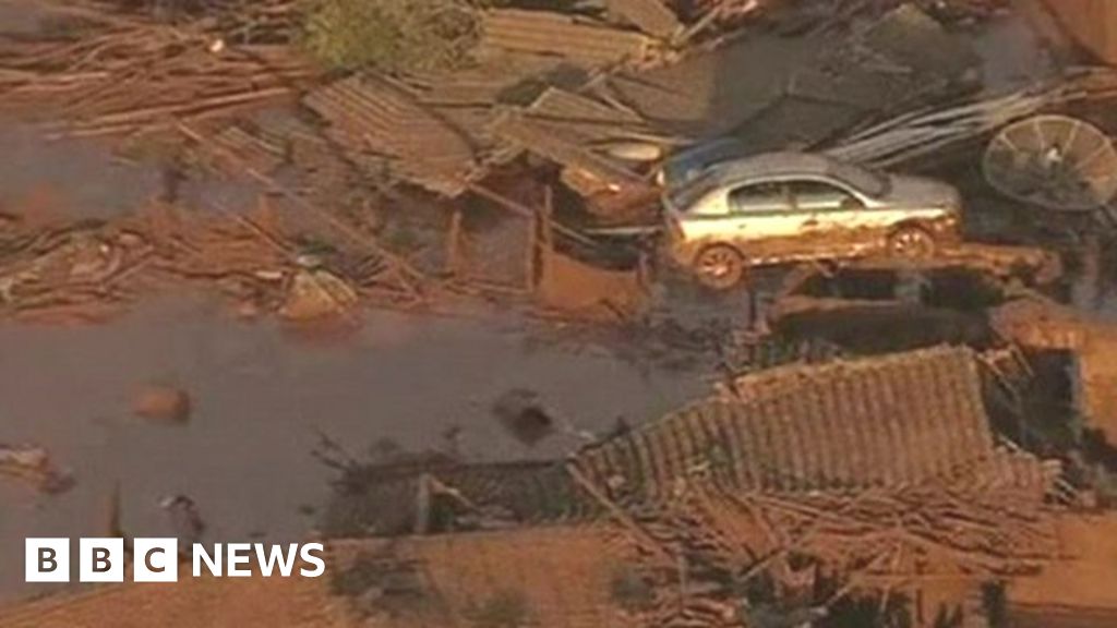 Brazil dam burst: One dead in Samarco iron ore mine dam burst near ...