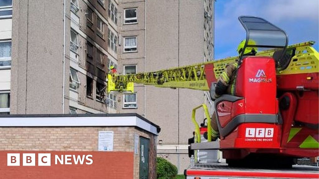 Erith: Two people rescued from London flat block fire - BBC News