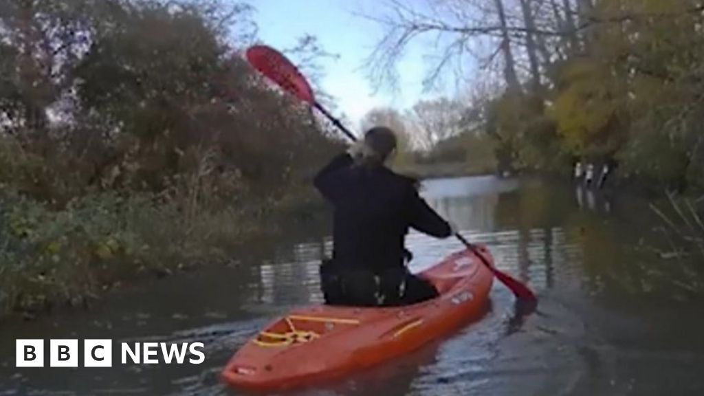 Sussex Police officers use kayaks attending drink-drive crash - BBC News