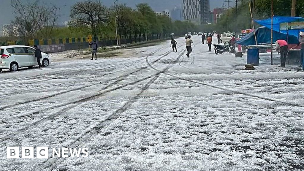 India capital Delhi enjoys unusual hail storm - BBC News