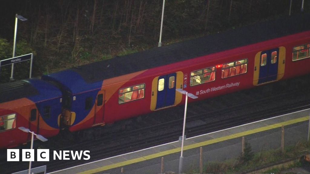 Surrey train stabbing: Hunt for suspect after man killed