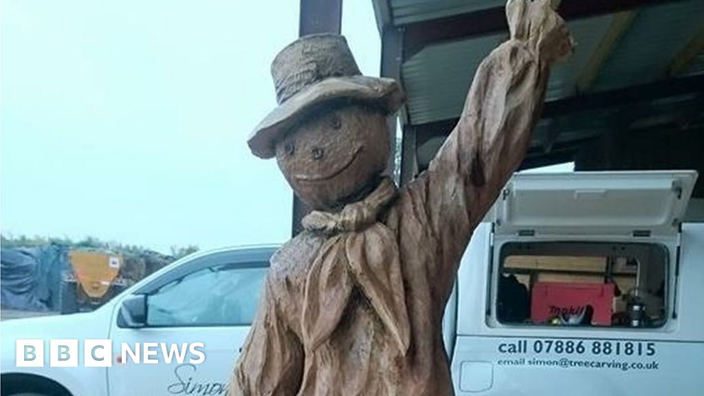 Stolen wood scarecrow statue Tattybogle found in Wrexham - BBC News
