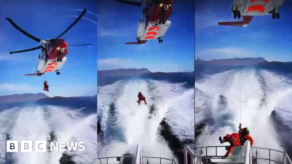 Winchman lowered to lifeboat in rescue of kayaker in Summer Isles - BBC ...
