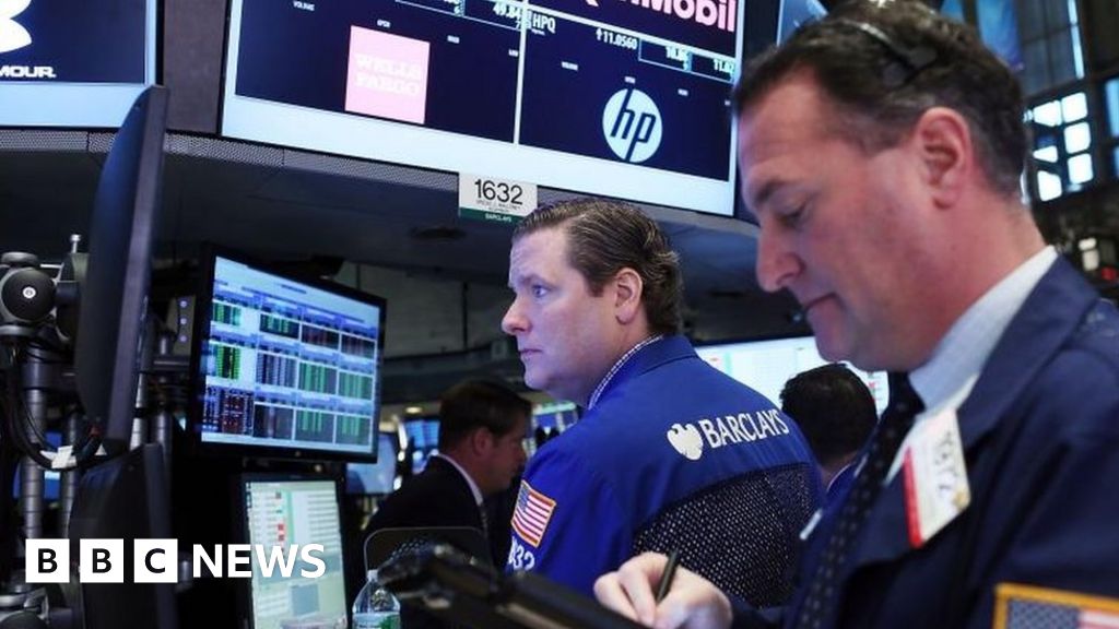 US stocks rise on Fed decision to hold interest rates - BBC News