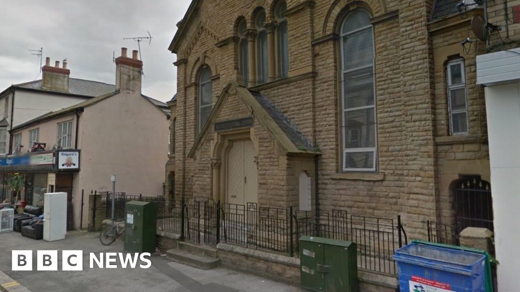 Three quizzed over racial fireworks arson at Rhyl Islamic centre - BBC News