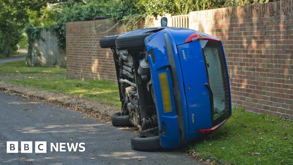 Armed boy tipped over car with fork-lift truck - BBC News