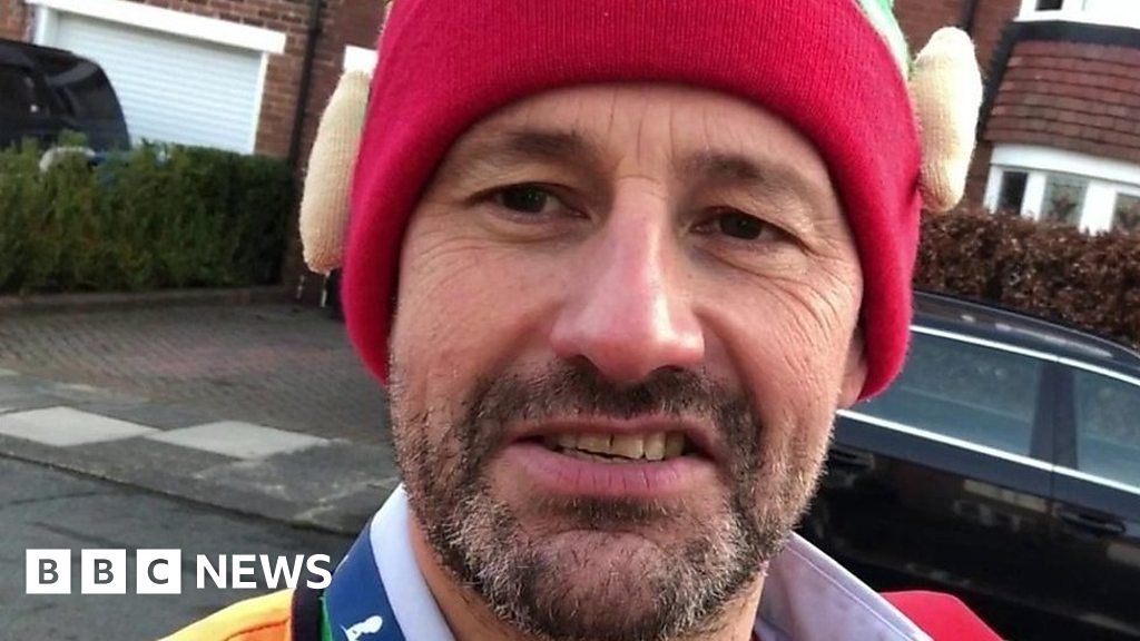 Is this the world's happiest postman?