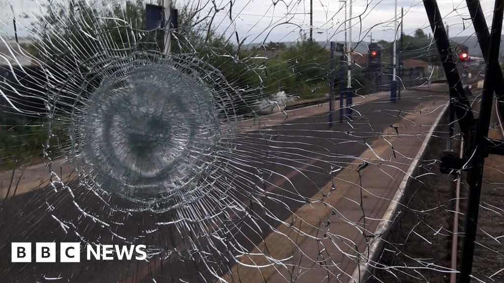 Stone thrown at moving train in Rochdale injures driver - BBC News