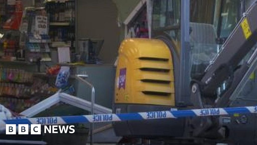 Shop badly damaged by digger