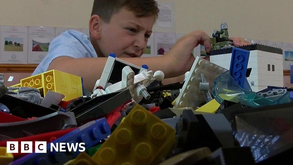 Autistic boy starts Lego club for other children - BBC News