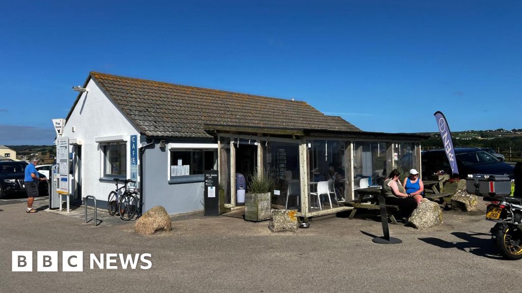 Cornwall beach cafe owner shell-shocked by Dua Lipa visit - BBC News