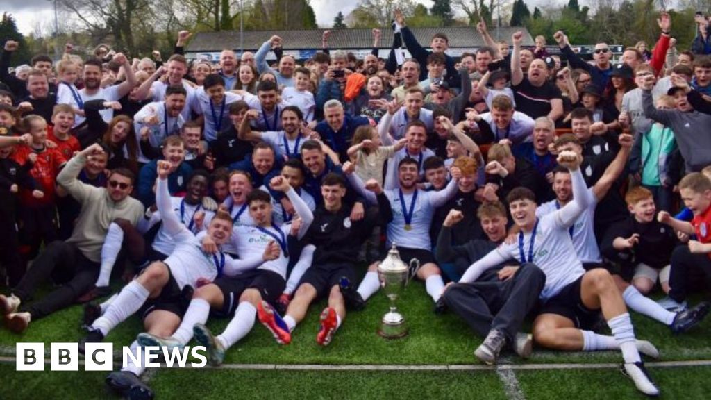 Merthyr Town: Players and fans celebrate promotion - BBC News