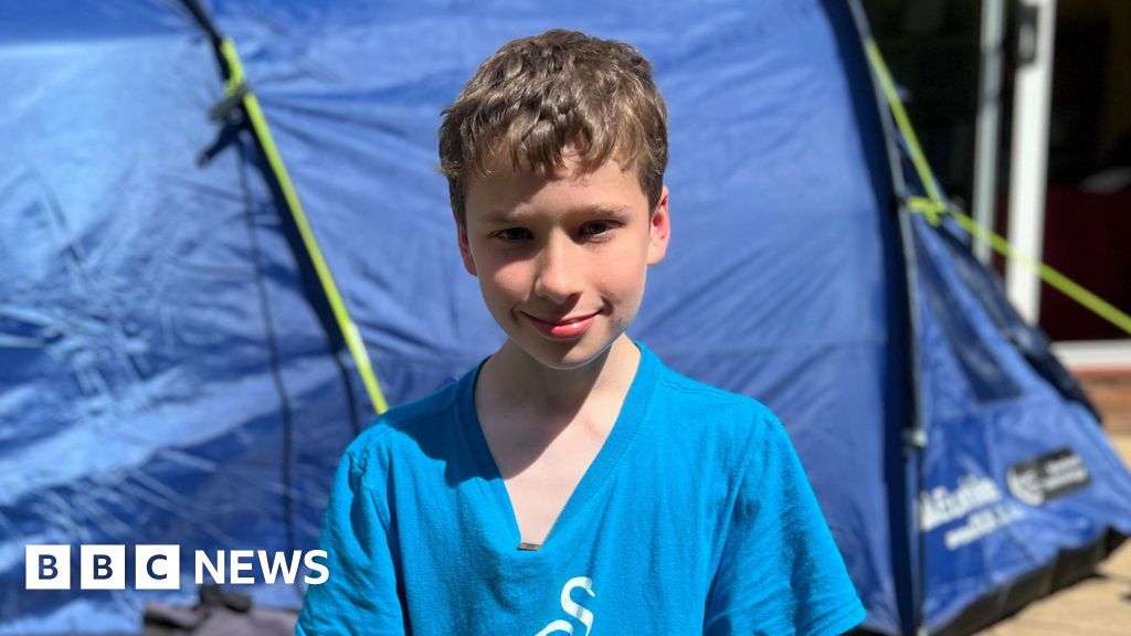Joshua from Milton Keynes is aiming for the camping out record - BBC News